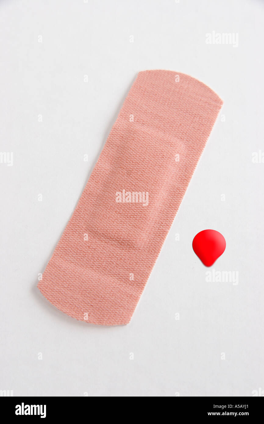 Plaster and fake blood spot Stock Photo - Alamy