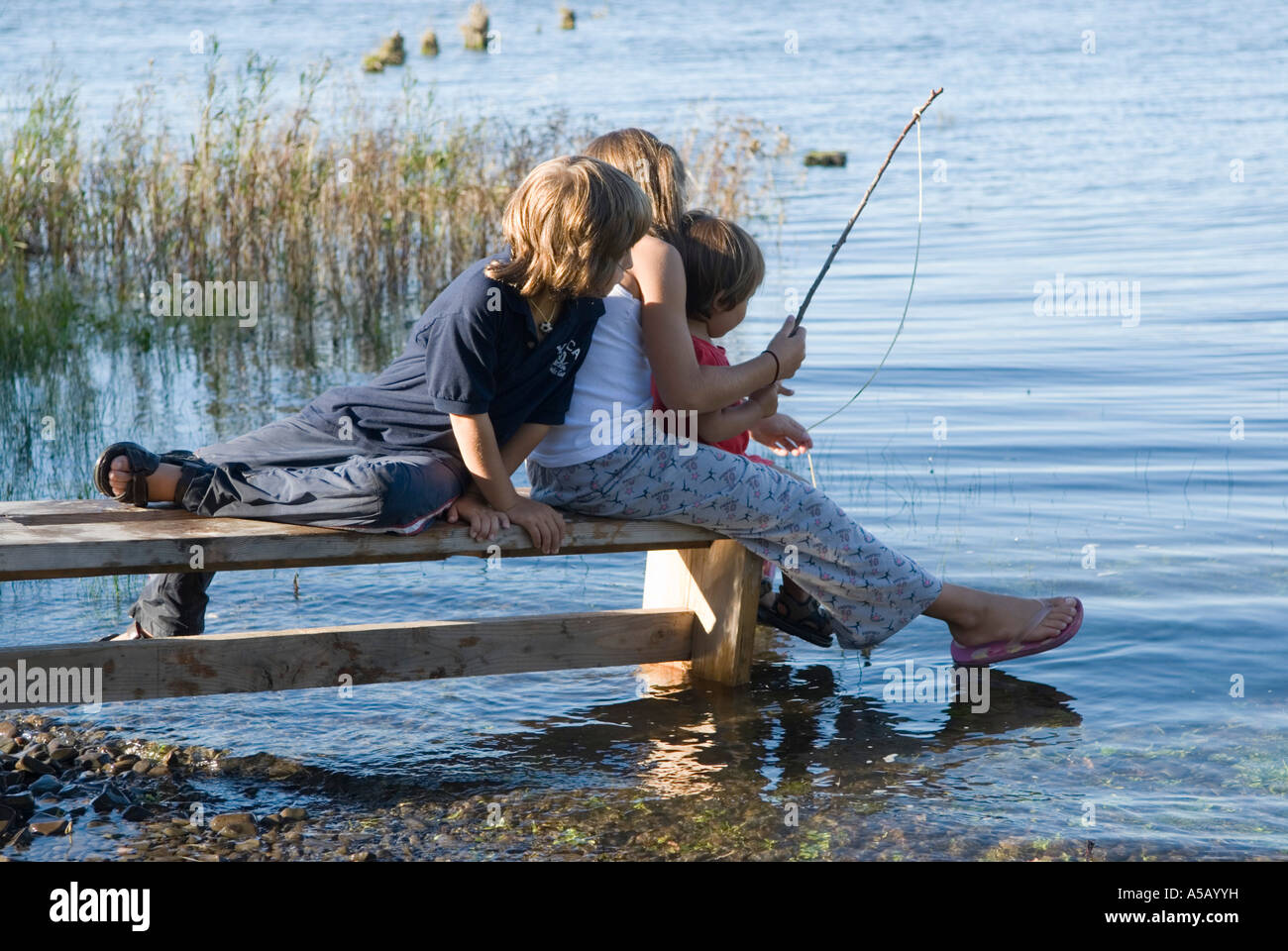 Children fish pond hi-res stock photography and images - Alamy