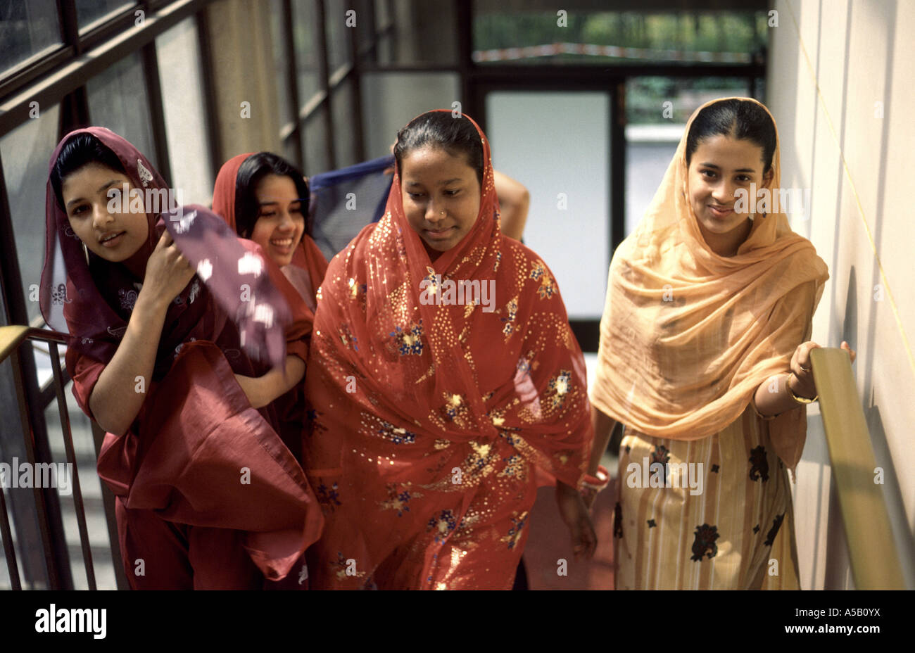 young Muslim women entering the mosque Stock Photo - Alamy