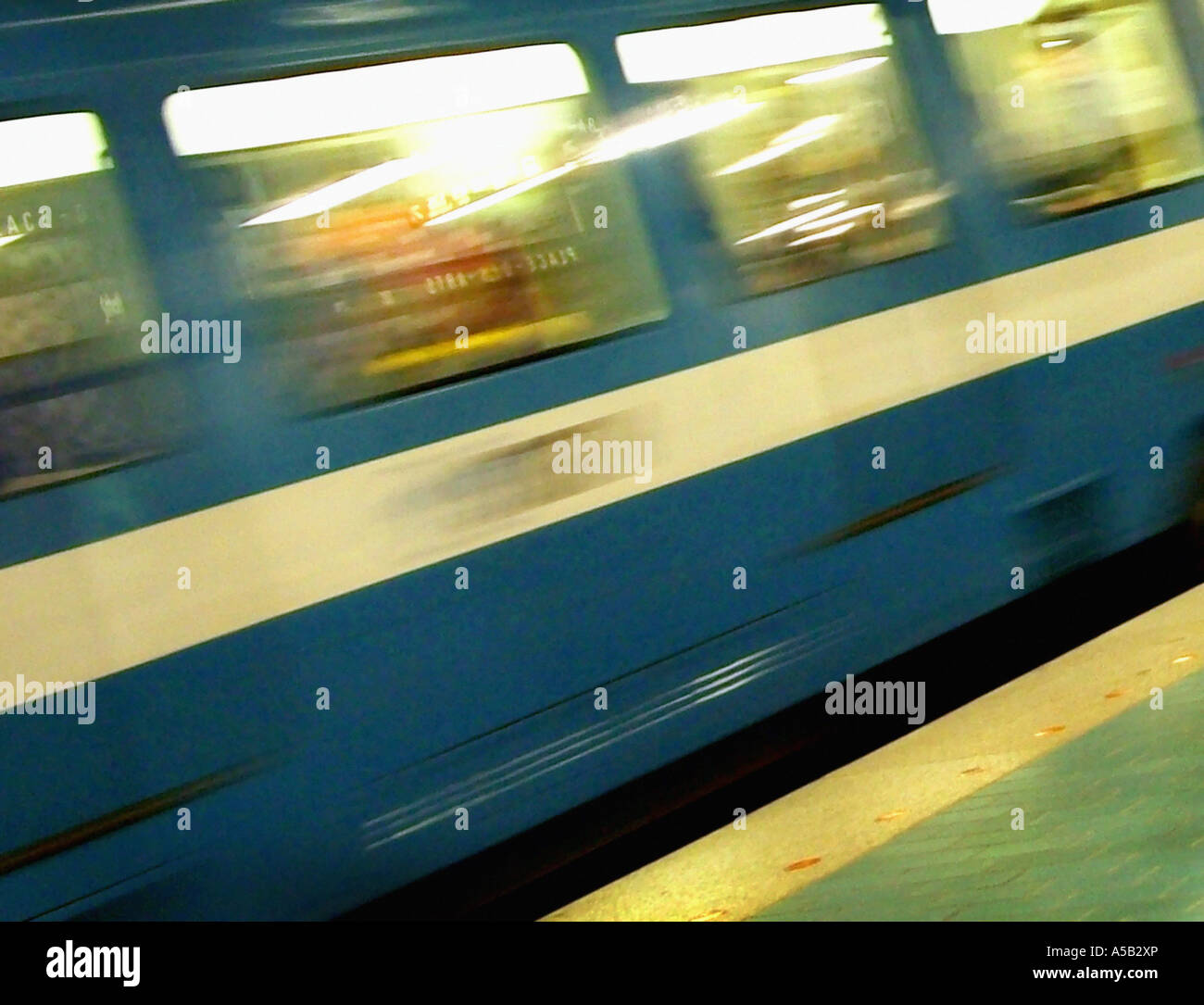 Subway tain car quickly moving by Stock Photo - Alamy