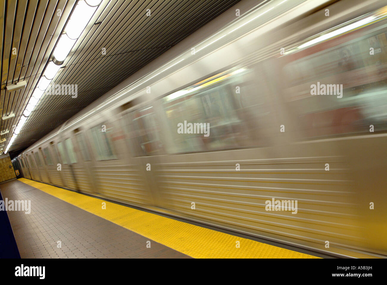 Speeding underground subway train Stock Photo - Alamy
