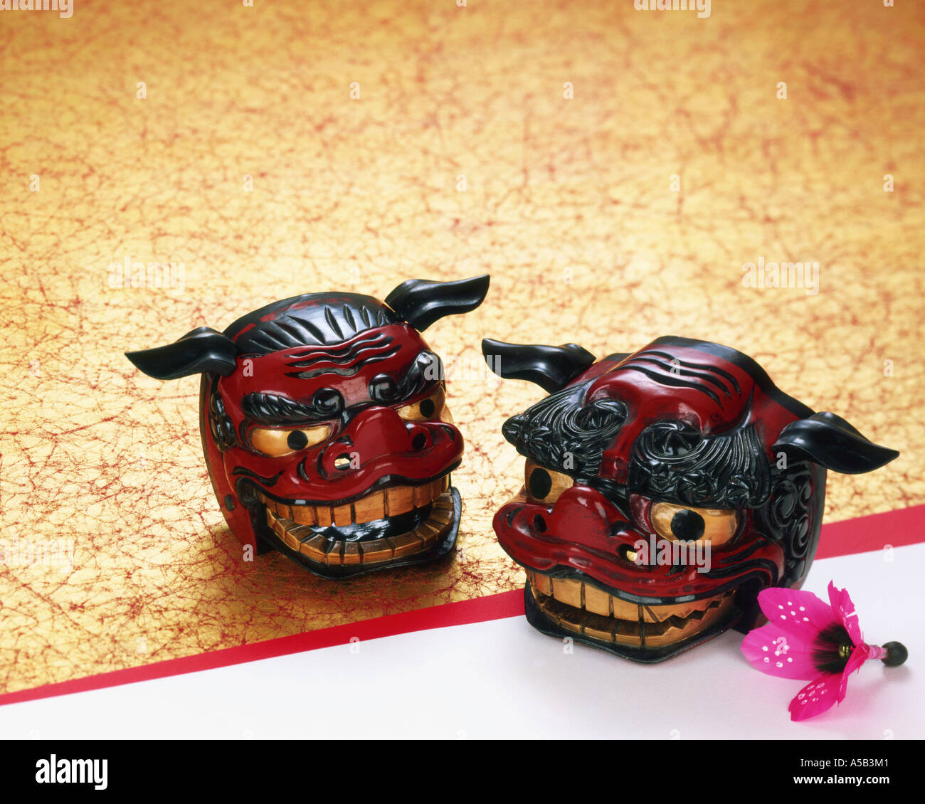 Lion mask and shuttlecock Stock Photo - Alamy