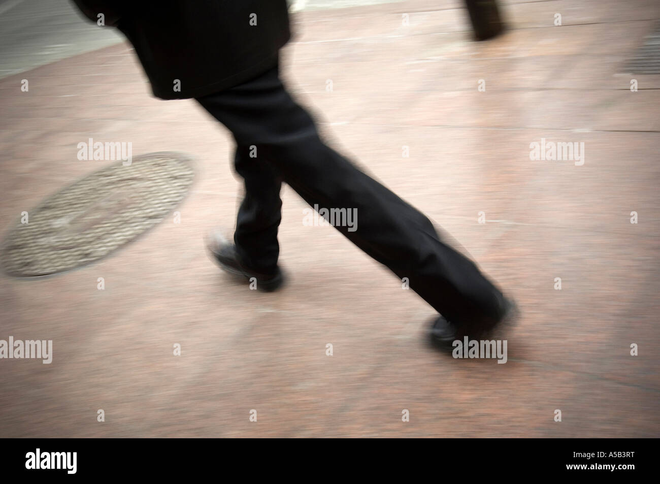 Businessman walking fast downtown hi-res stock photography and images ...