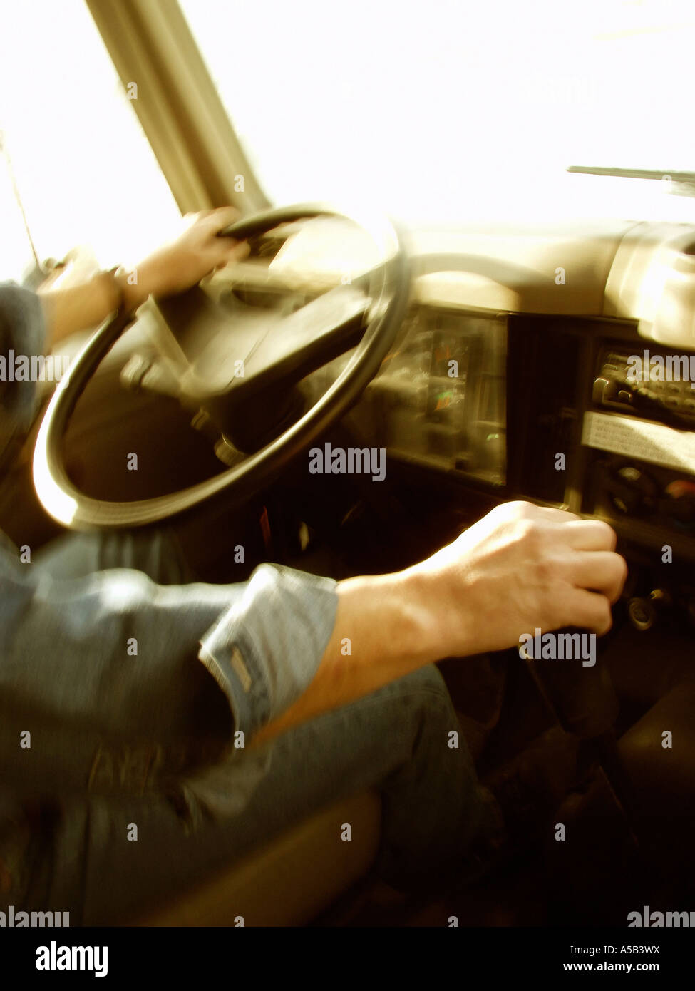 Truck driver inside his cab Stock Photo - Alamy