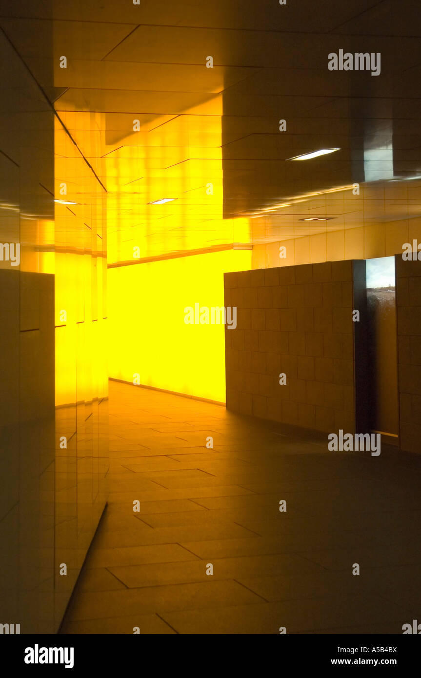 Bright light reflecting off hallway wall Stock Photo - Alamy