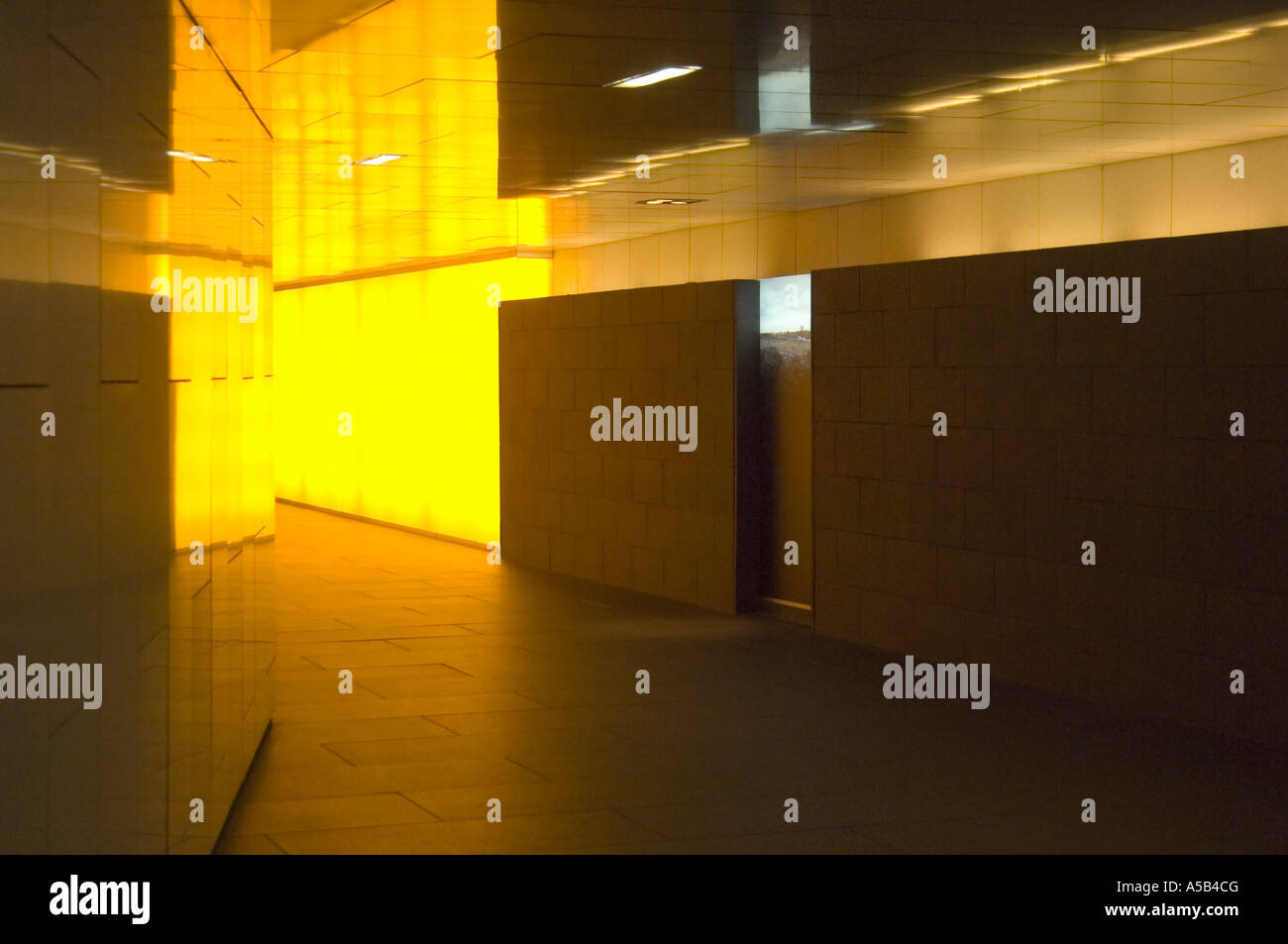 Bright light reflecting down hallway Stock Photo - Alamy