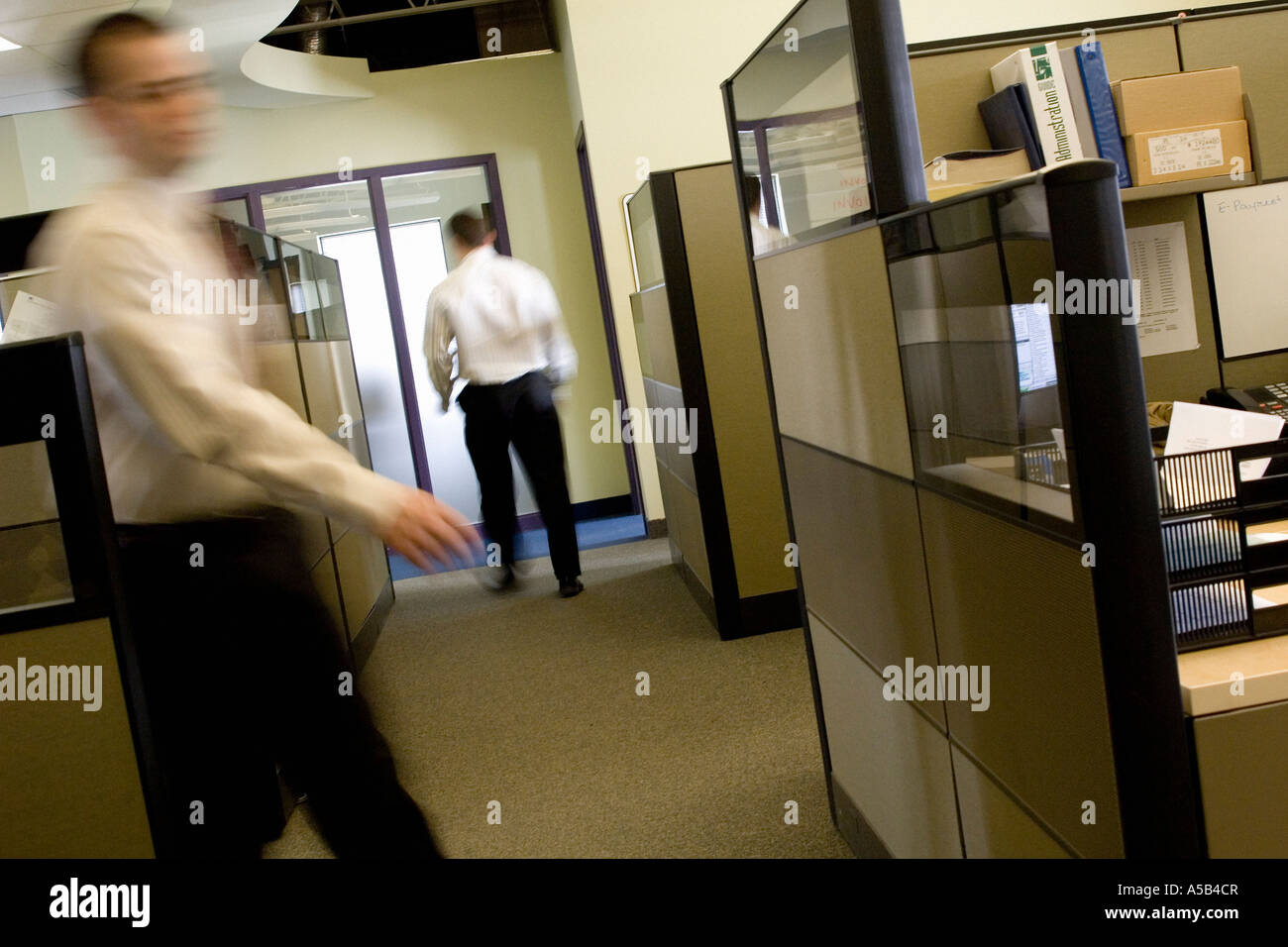Busy corporate office corridor Stock Photo - Alamy