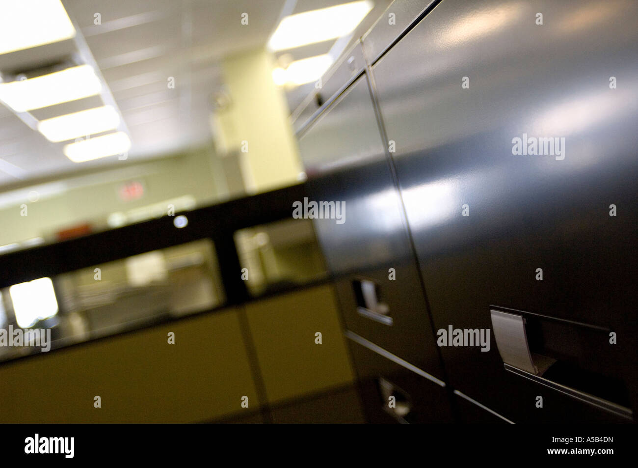 Filing cabinets in office cubicle Stock Photo - Alamy