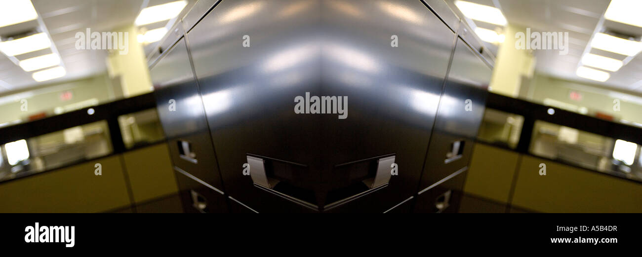 Mirrored composition of filing cabinet in office cubicle Stock Photo ...