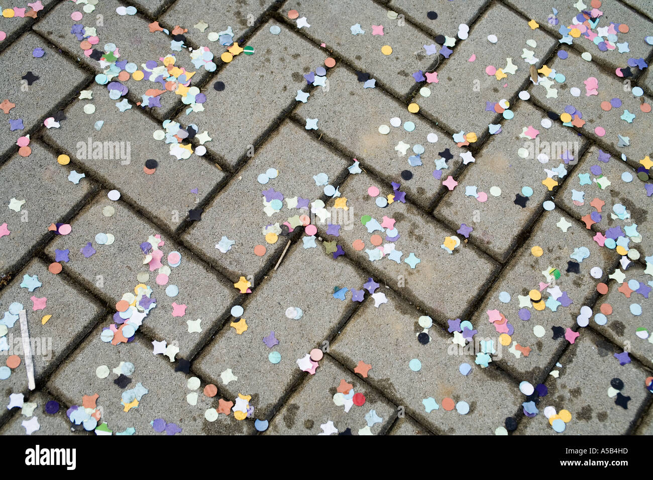 carnival confetti on the ground Stock Photo - Alamy