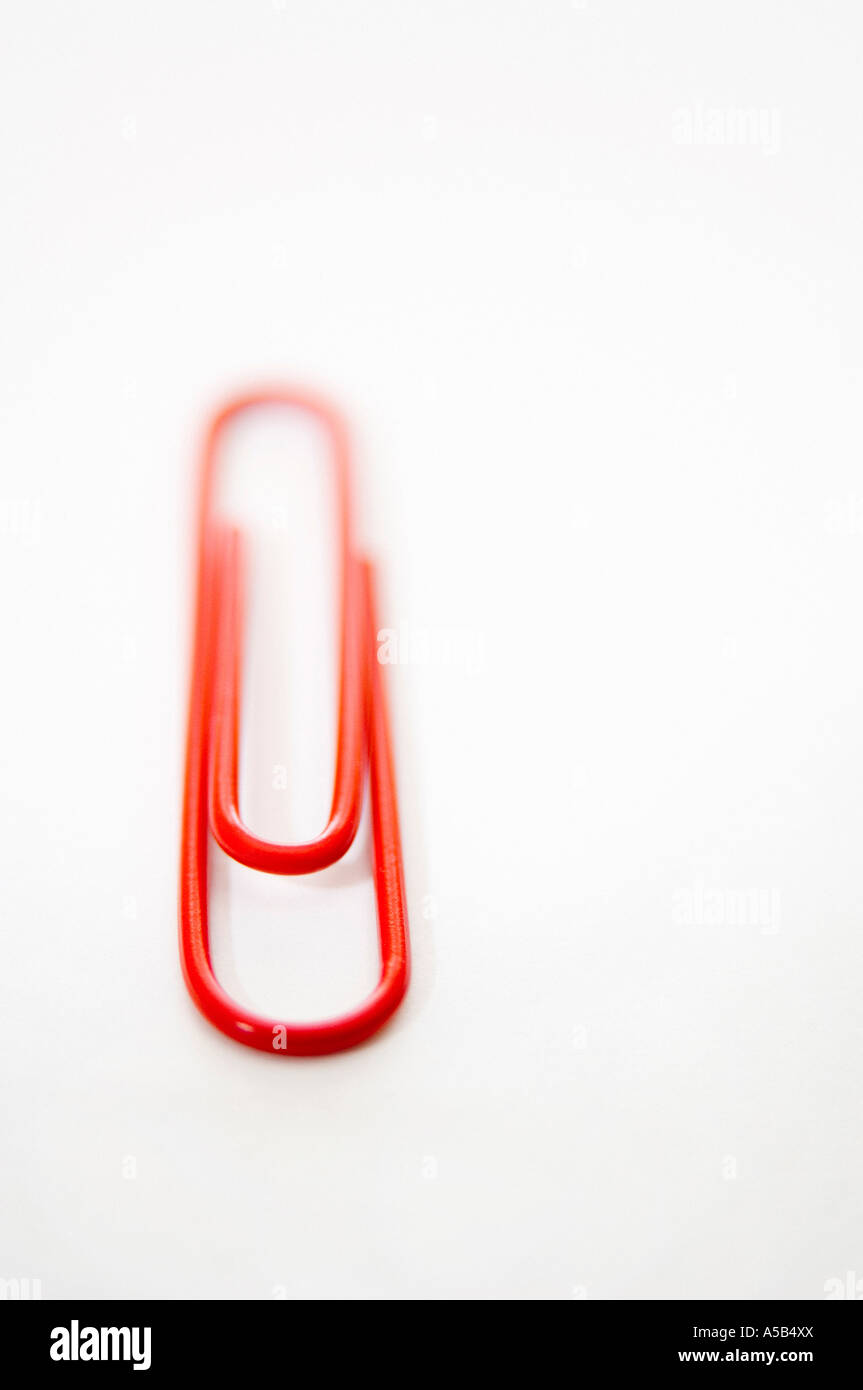 Single red paperclip Stock Photo - Alamy