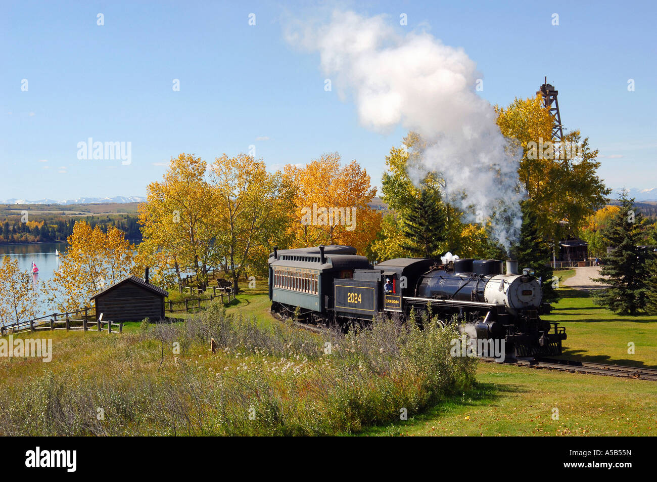 Vintage steam engine train traveling through Heritage Park in Calgary ...
