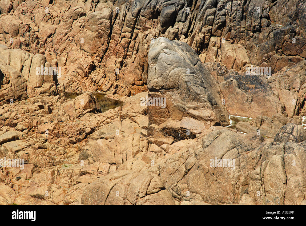 Warm Solid Rock Stock Photo - Alamy