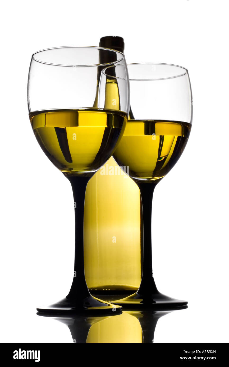 Glass and bottle of white wine Stock Photo - Alamy