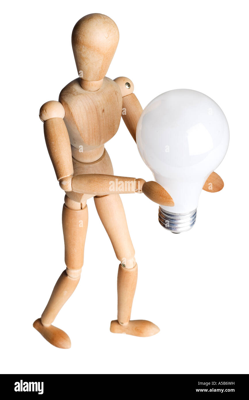 Manikin holding a light bulb Stock Photo - Alamy