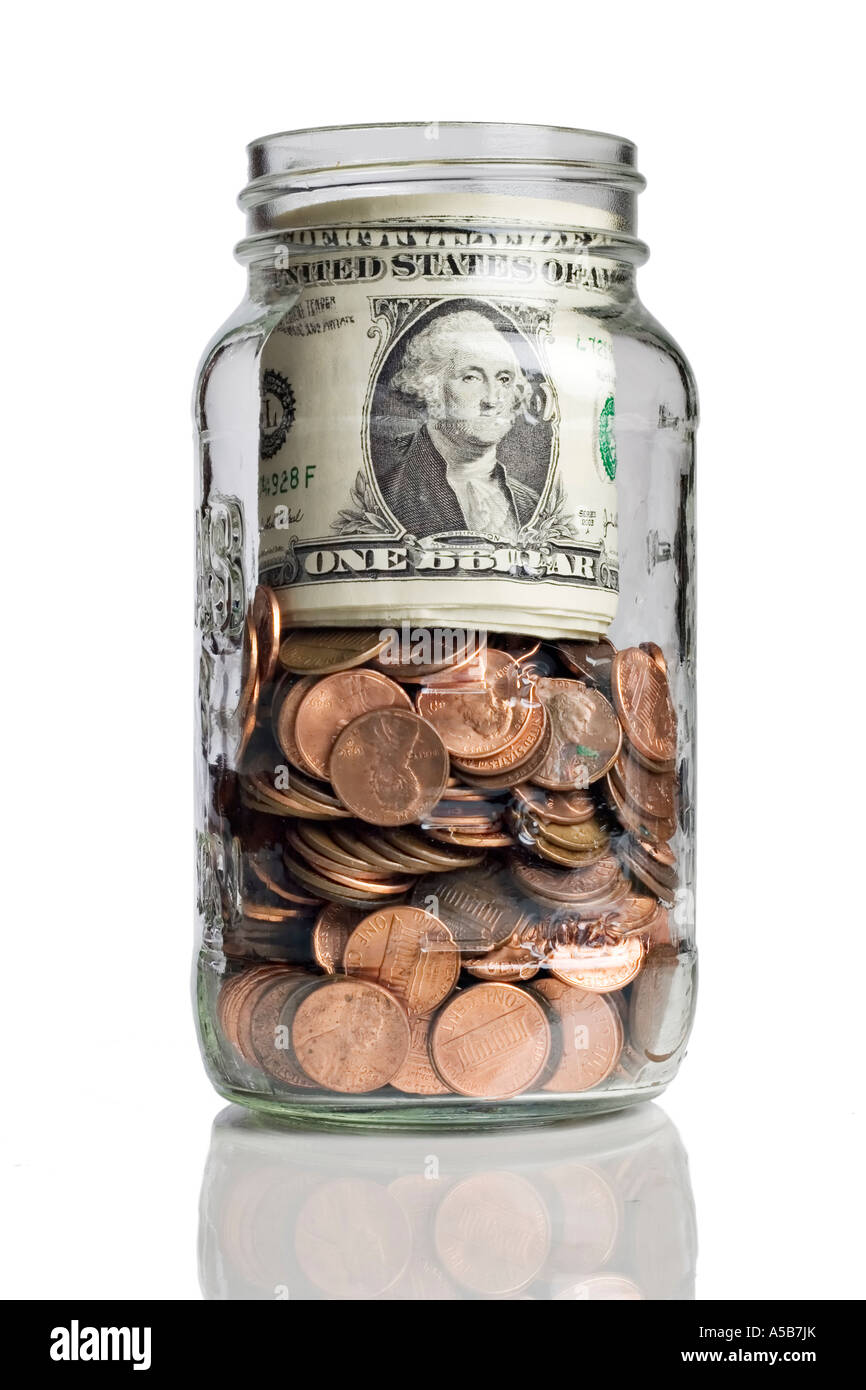 jar half full of pennies and dollar bills Stock Photo - Alamy