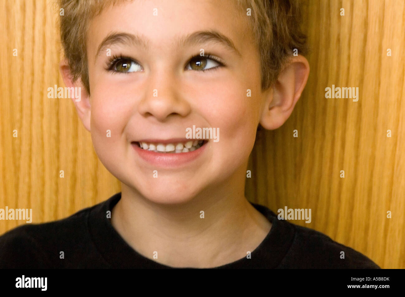 Young healthy boy with mischievous smile Stock Photo - Alamy