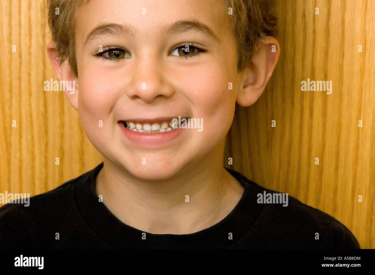 Young healthy boy with toothy smile Stock Photo - Alamy