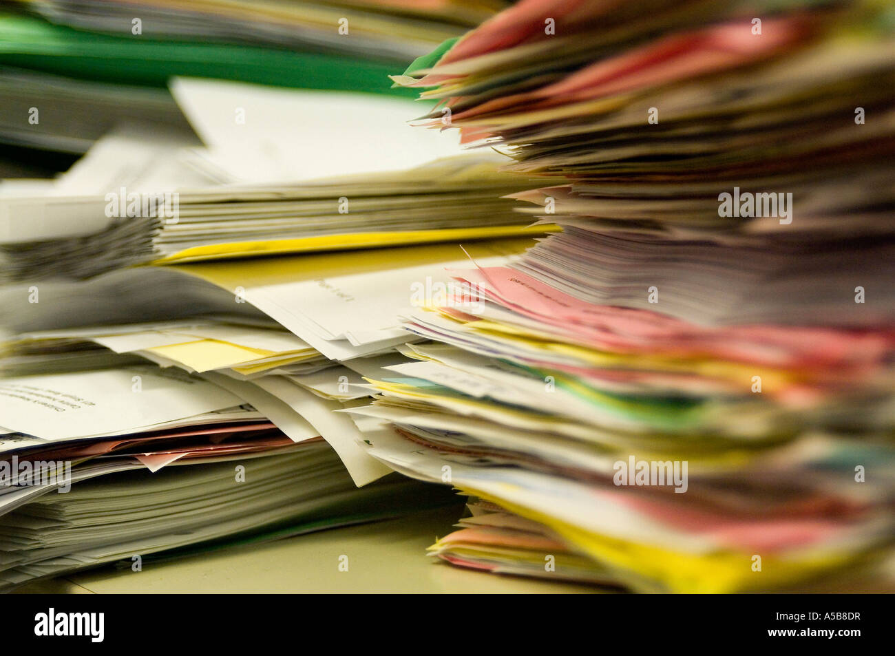 Stacks of paper ready to be filed Stock Photo - Alamy