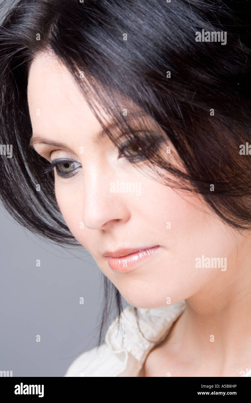 woman looking down beauty portrait Stock Photo - Alamy