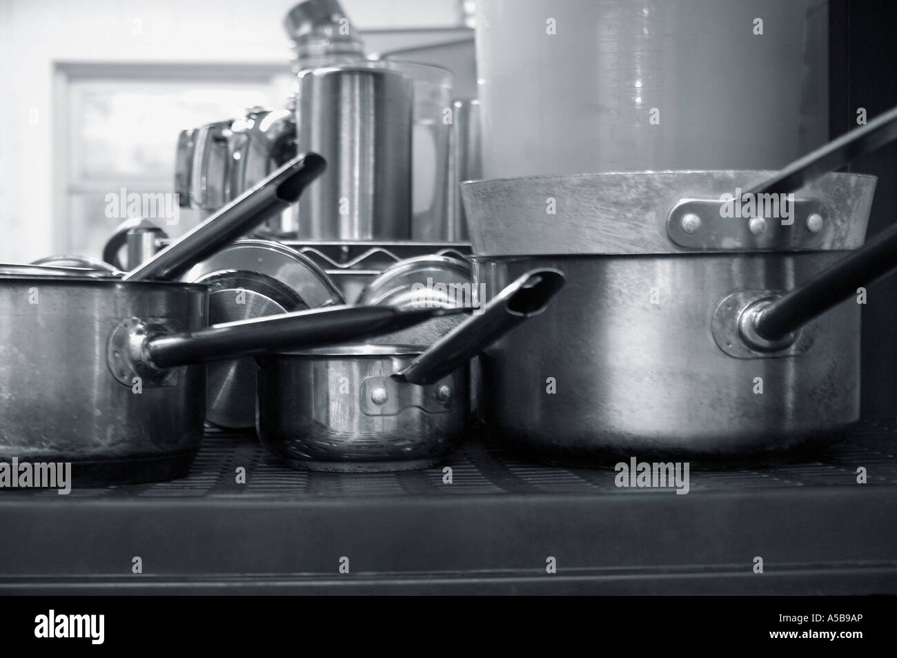 Pots and pans ready for use in a restaurant kitchen Stock Photo - Alamy