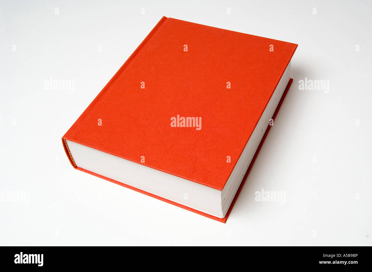 Blank red book on white background Stock Photo - Alamy