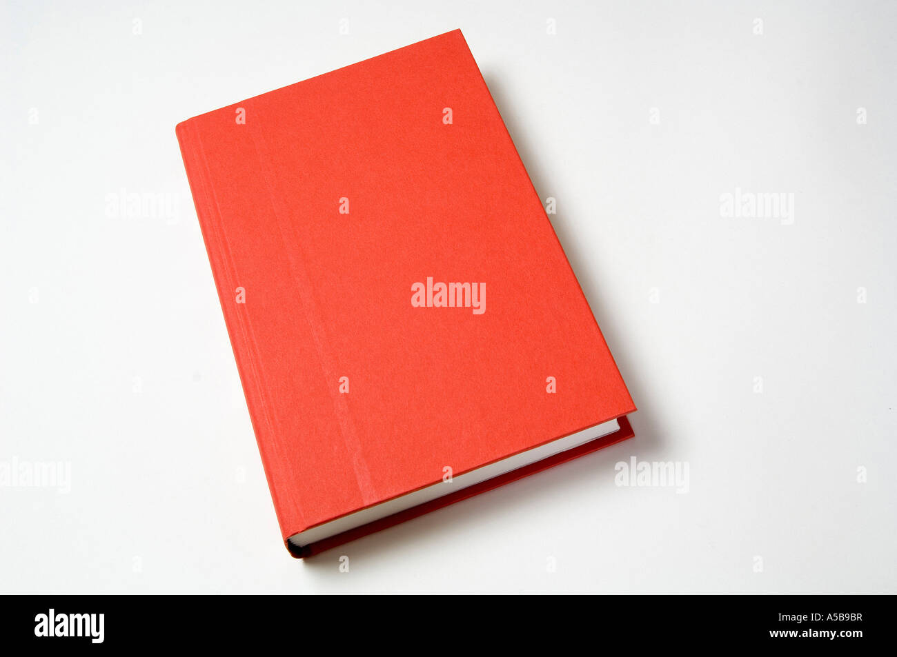 Blank red book on white background Stock Photo - Alamy