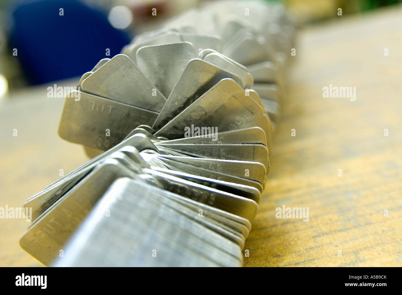 Metal tags spread out in a row Stock Photo - Alamy