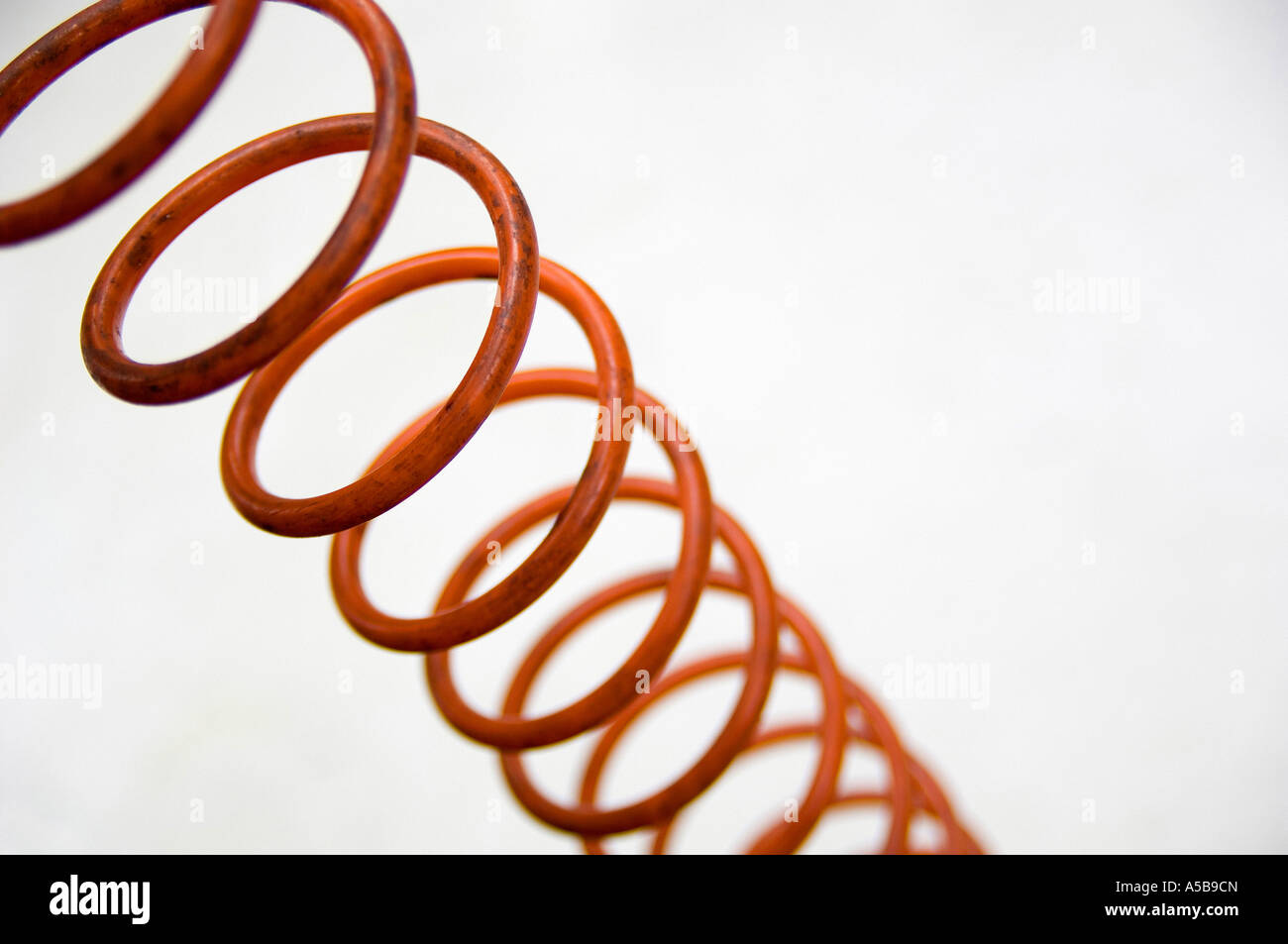 Circular spring like hose Stock Photo - Alamy