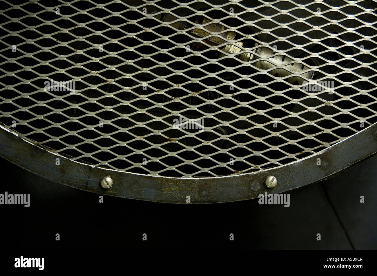 Metallic grill with screws Stock Photo - Alamy
