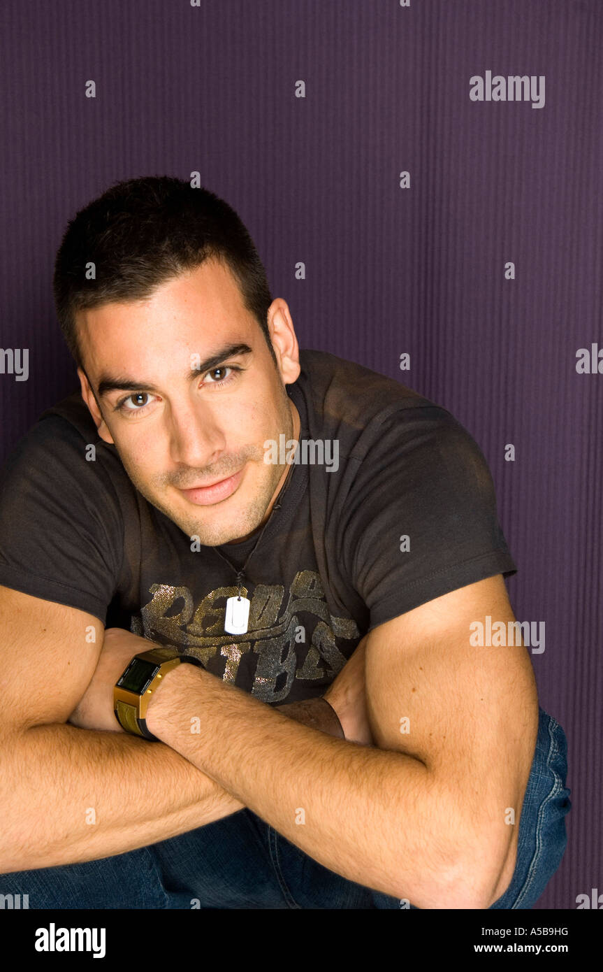 Young man posing in photo booth Stock Photo - Alamy