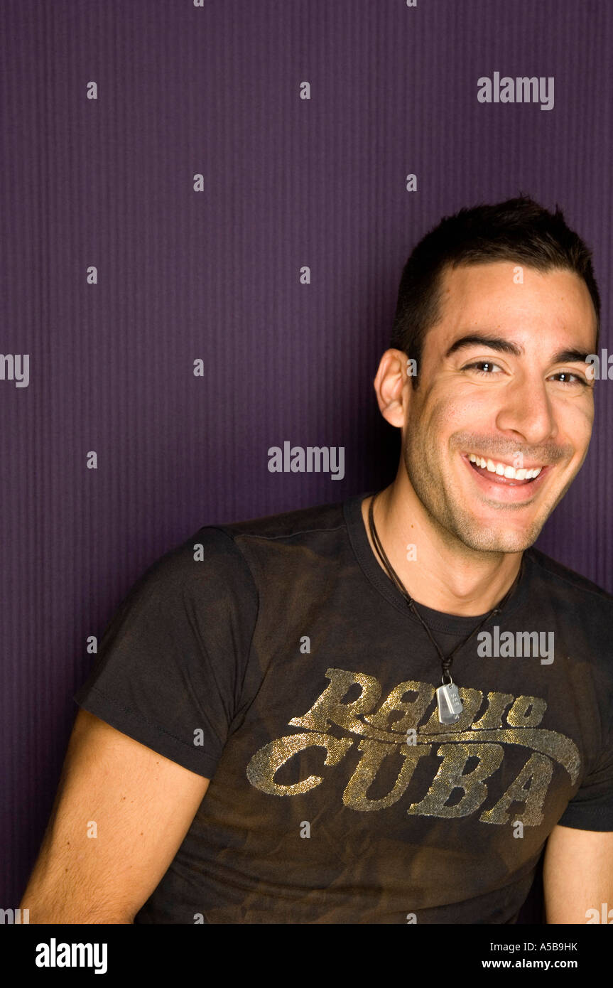 Young man posing in photo booth Stock Photo - Alamy