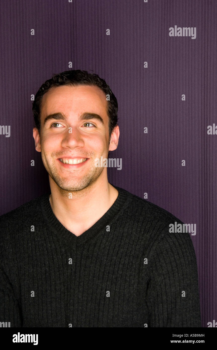 Young man posing in photo booth Stock Photo - Alamy