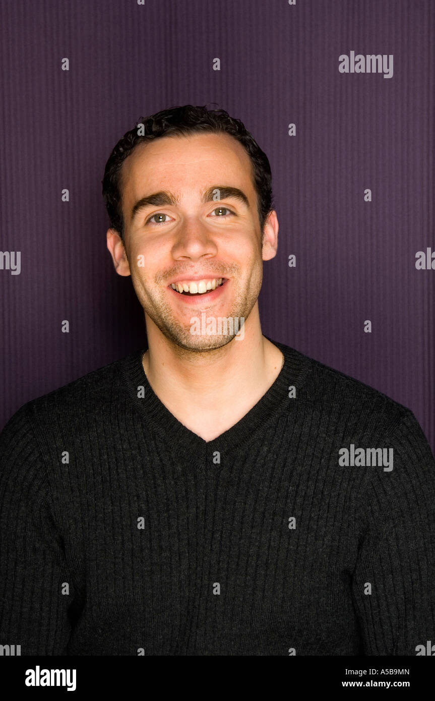 Young man in photo booth Stock Photo - Alamy
