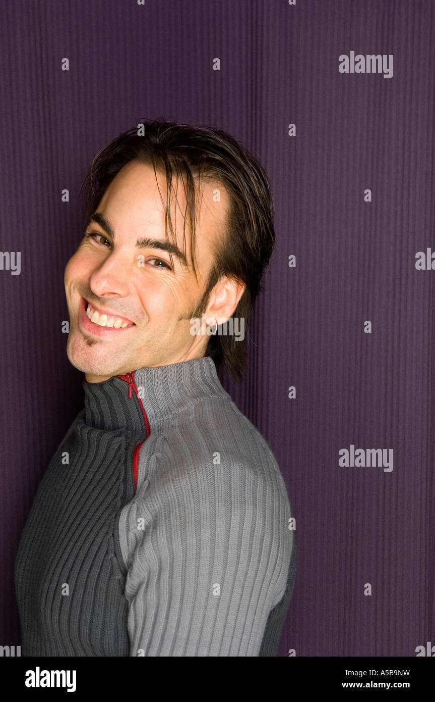 Young man posing in photo booth Stock Photo - Alamy