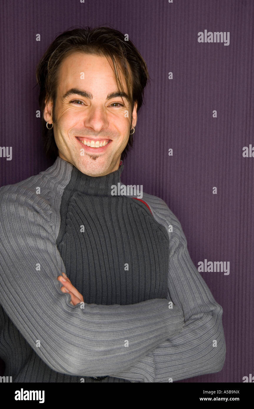 Young man posing in photo booth Stock Photo - Alamy