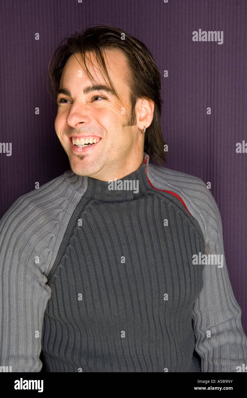 Young man posing in photo booth Stock Photo - Alamy
