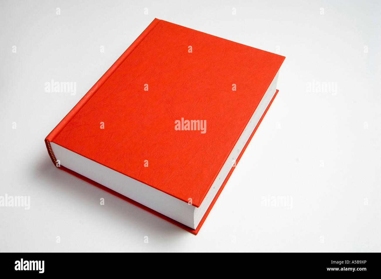 Blank red book on white background Stock Photo - Alamy
