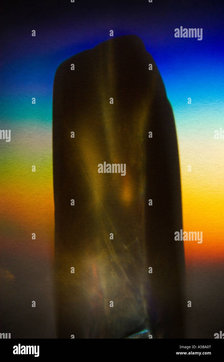 Close-up of light refracting through spectrum prism Stock Photo - Alamy