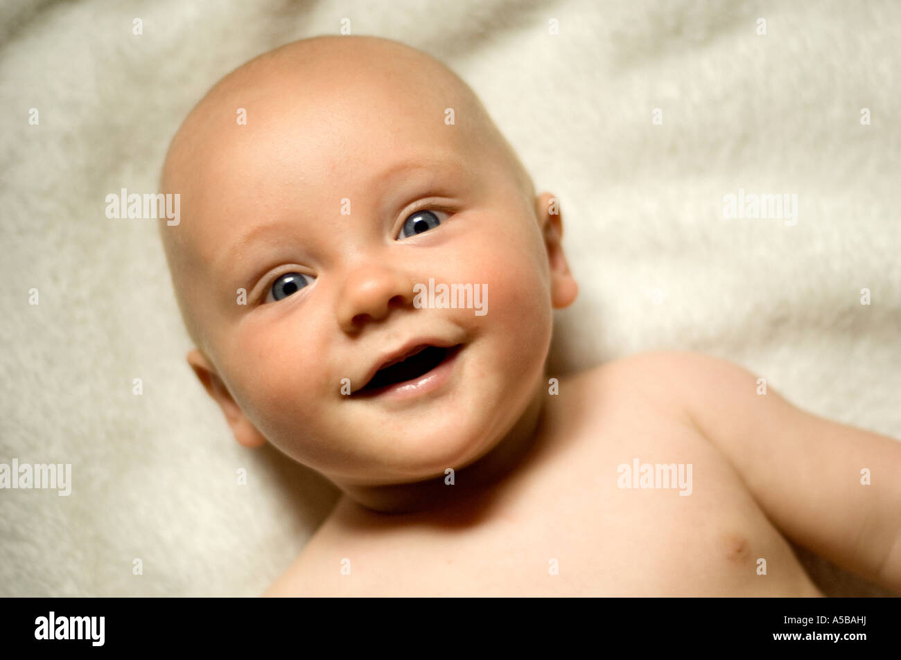 Face of a cute happy baby Stock Photo - Alamy