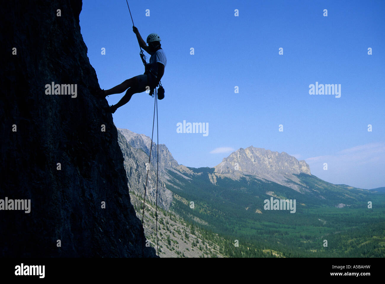 Rock climbing repelling hi-res stock photography and images - Alamy