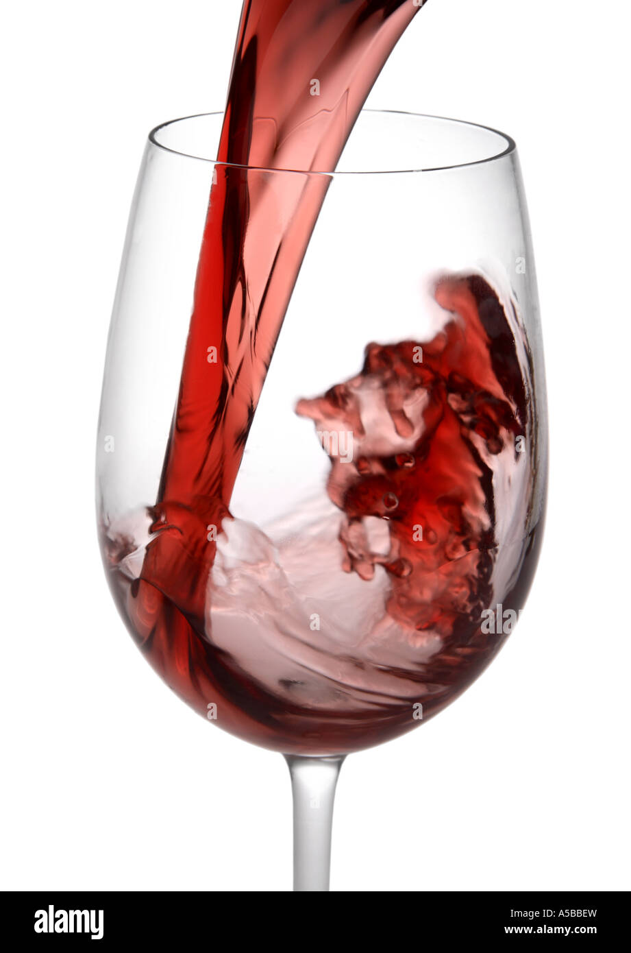 Pouring Red Wine cut out on white background Stock Photo - Alamy