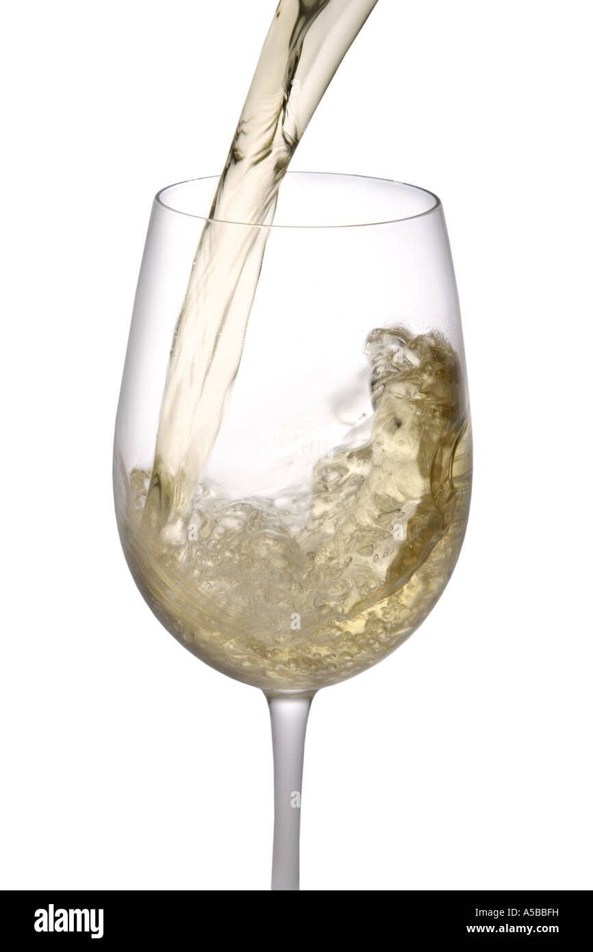Pouring White Wine cut out on white background Stock Photo - Alamy