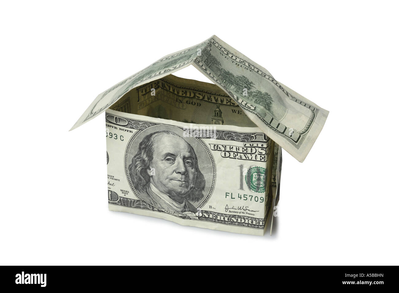 House made of money cut out on white background Stock Photo - Alamy
