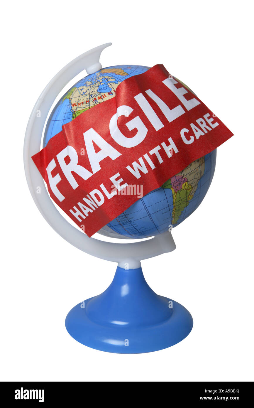 Fragile Sticker on Globe cut out on white background Stock Photo - Alamy