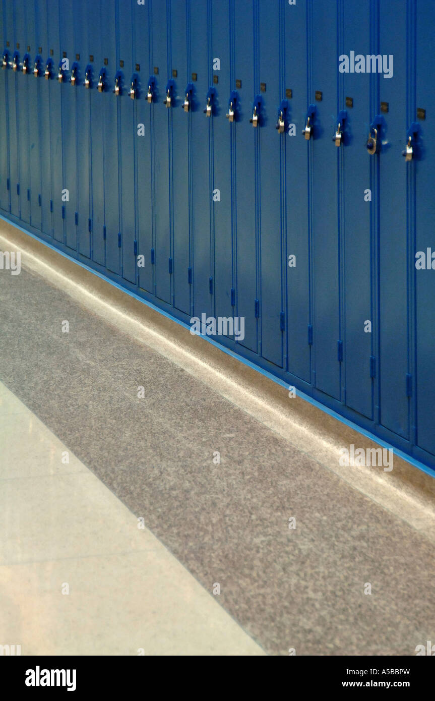 Row of locked blue lockers in school hallway with locks Stock Photo - Alamy