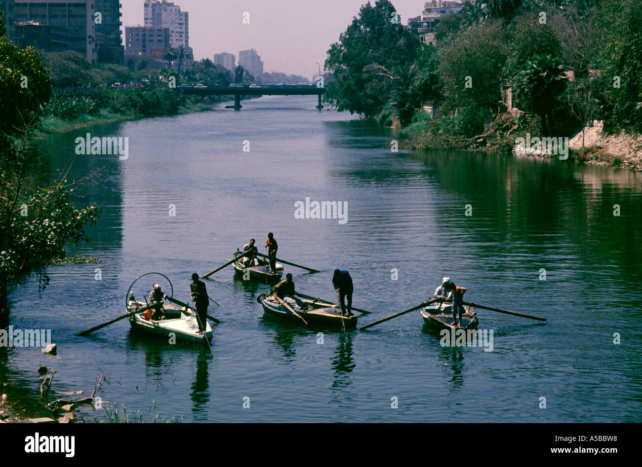 People boating at the Nile river Roda Island or Rawdah Island Cairo ...