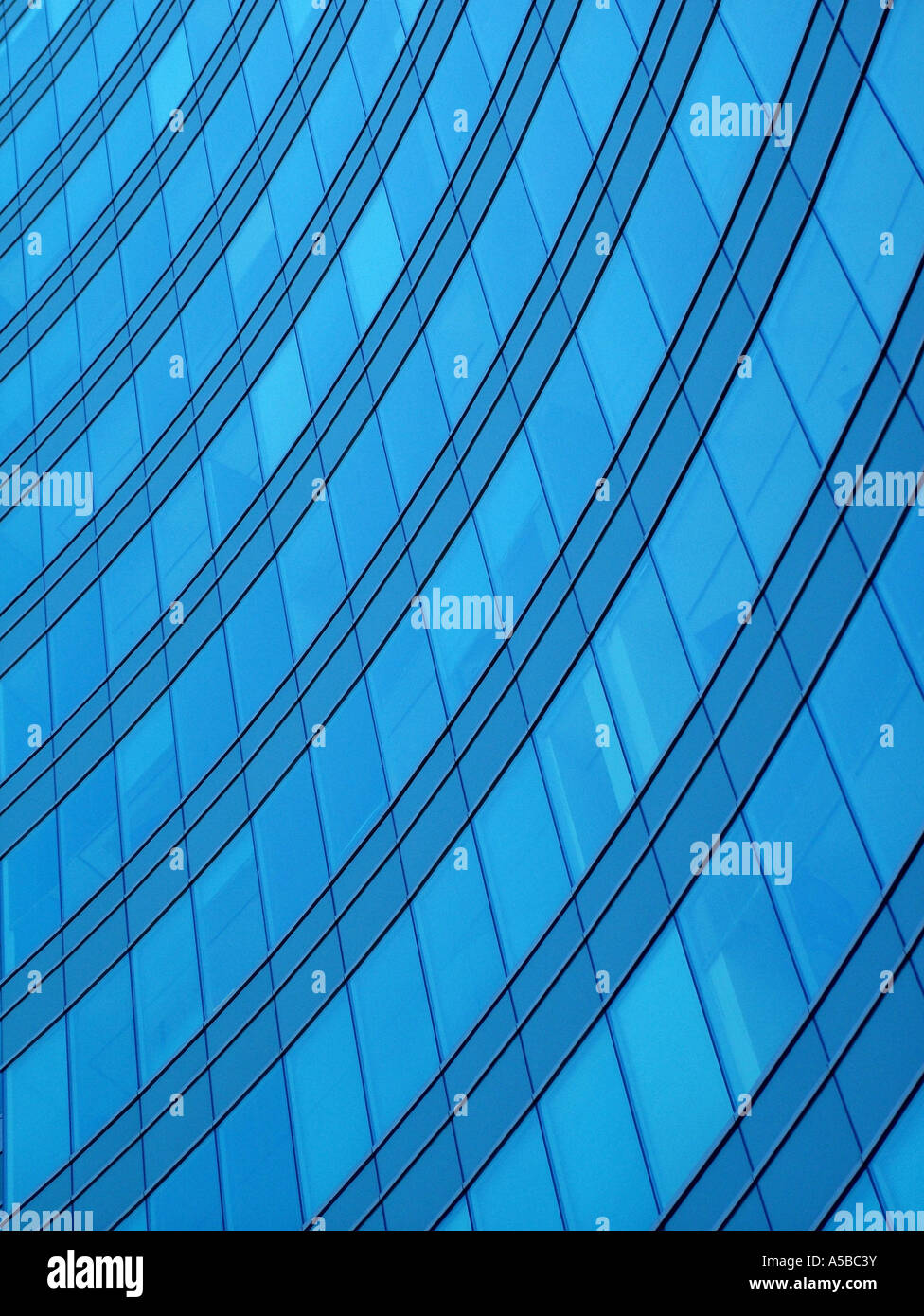 Architectural abstract of glass windows in office building Stock Photo ...