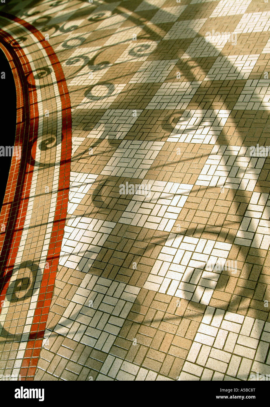 Elegant shadows on tiled floor Stock Photo - Alamy