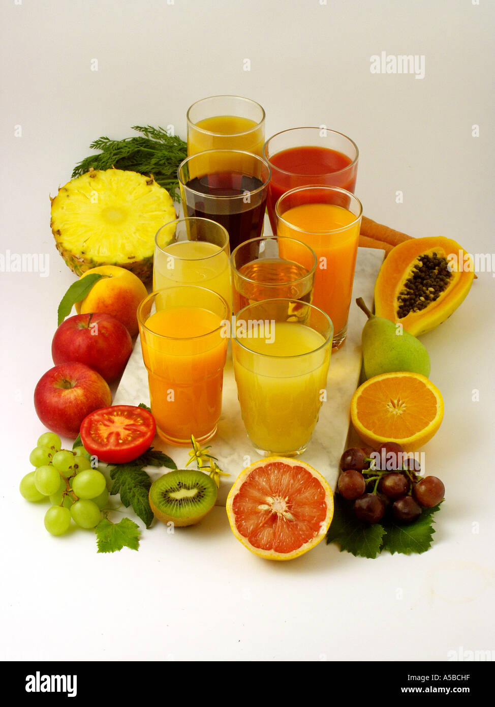 Assorted fruits and juice Stock Photo - Alamy